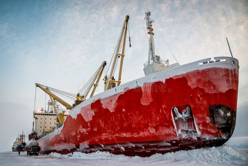 Ship in ice on unloading. stock image. Image of cargo - 120831157