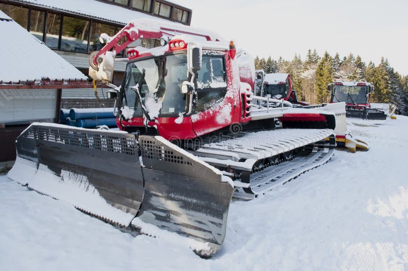 Red icy ratrak stock photo. Image of snow, maintenance - 12351430