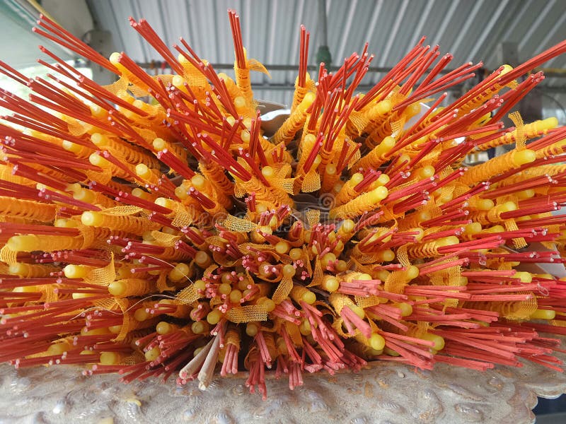 Red Incense Sticks and Yellow Candles in an Buddhist Temple Stock Image ...