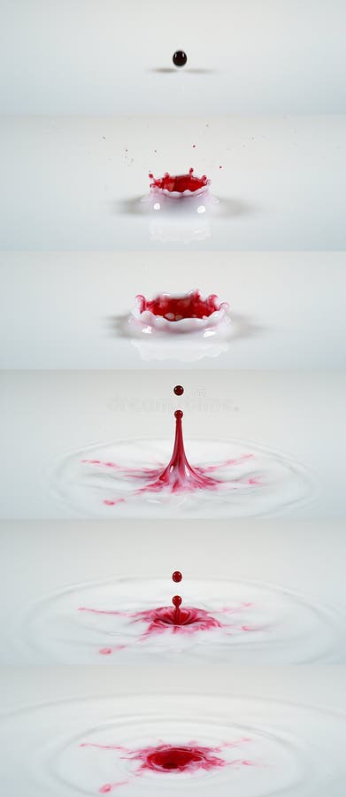 Red Ink Falling into Liquid Against White Background Stock Photo ...