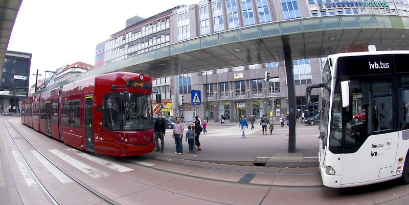 Red Innsbruck Tram and White Bus Editorial Photography - Image of ...