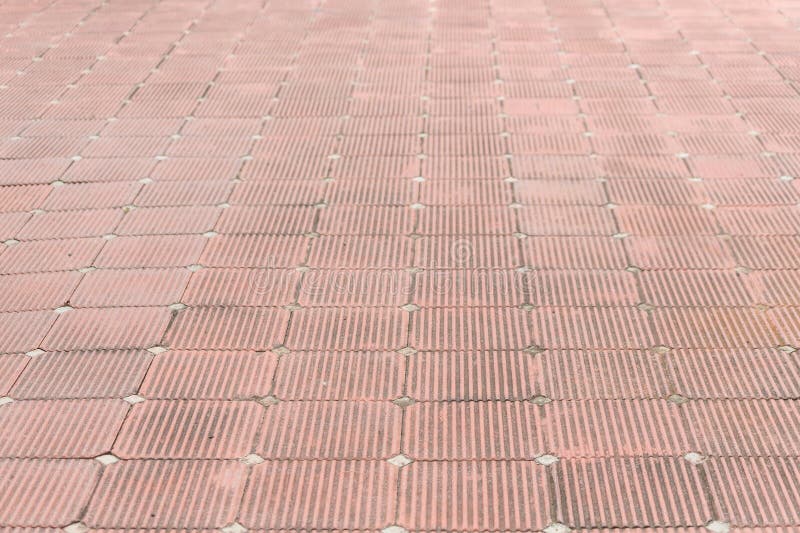 Red Interlocking Pavement Tile Grid with Vertical Grooves and Small ...