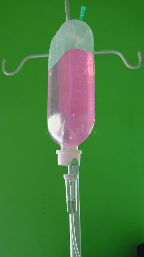 Red Intravenous Fluid is Being Administered To the Patient Stock Photo ...