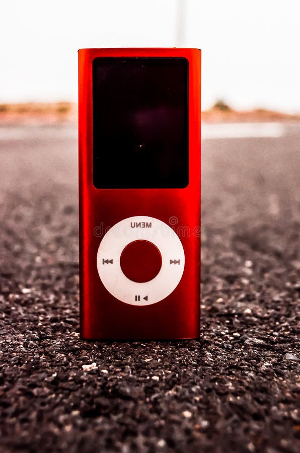 A Red IPod Sits on the Ground Stock Image - Image of mobile, screen ...