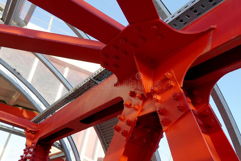 Red Iron Beams Bolted on. Angular Connection of Several Iron Beams in ...