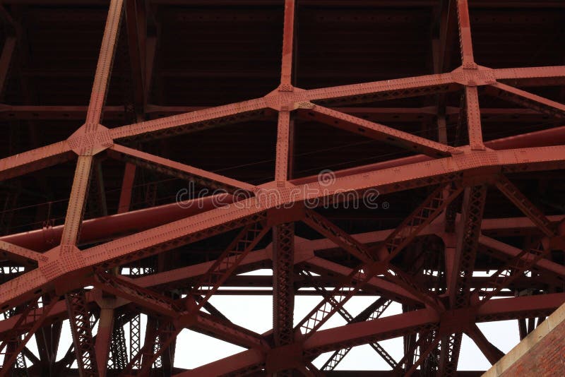 Red Iron Beams Under the Golden Gate Bridge Stock Image - Image of gate ...