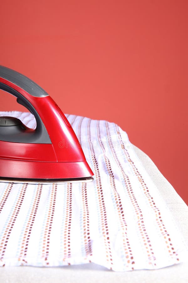 Red Iron and shirt stock photo. Image of heat, life, clothing - 24831258