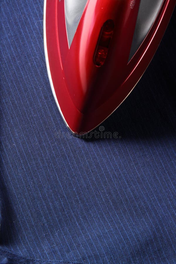 Red Iron and shirt stock image. Image of life, clothing - 31420617