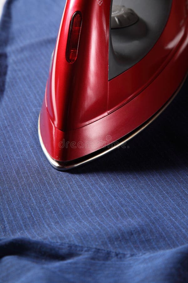 Red Iron and shirt stock image. Image of clean, iron - 31614877
