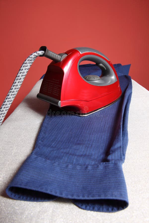 Red Iron and shirt stock image. Image of life, collar - 31715837