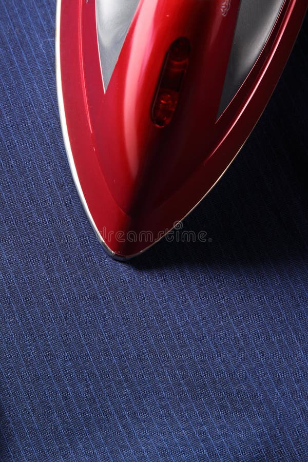 Red Iron and shirt stock image. Image of home, laundry - 32561961