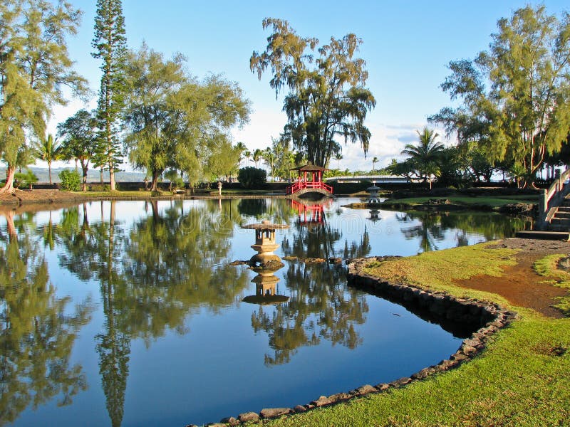 Red Japanese Bridge Over a Pond with Reflection Stock Image - Image of ...