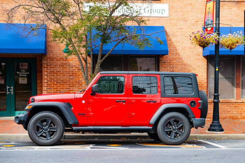Red Jeep Wrangler Parked in Front of a Red Brick House Editorial Stock ...