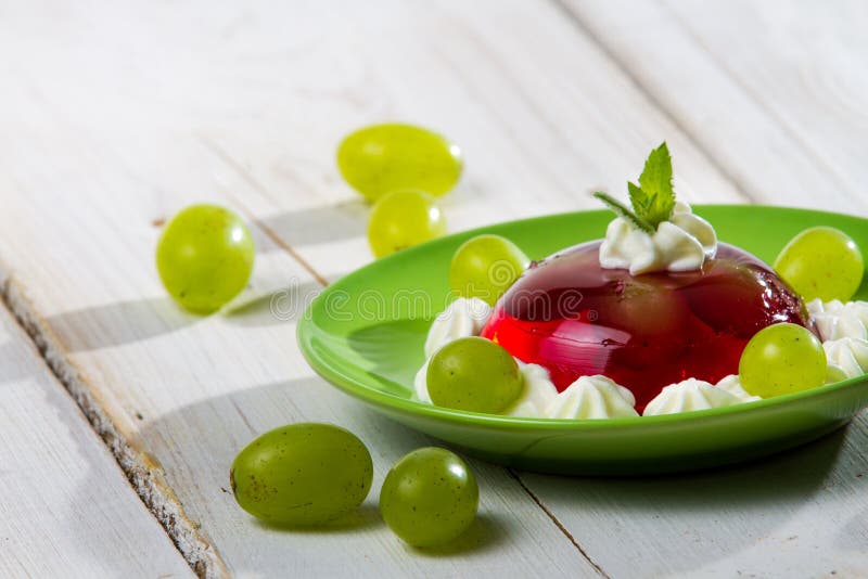 Red Jelly and Grapes Served on a Plate Stock Image - Image of sweet ...