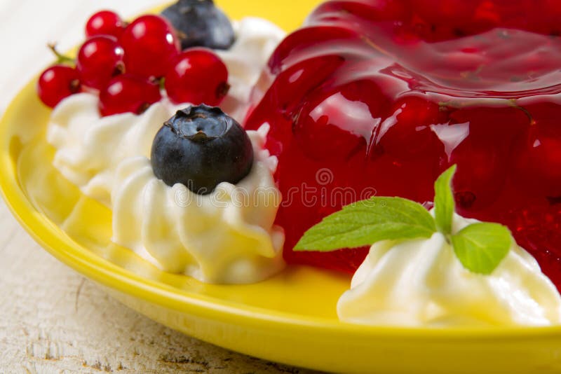 Red Jelly Served on a Plate with Berry Fruit Stock Image - Image of ...