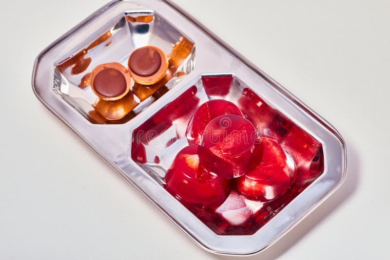 Red Jelly Strawberry and Cherry Candy on a Metal Plate Macro Stock ...