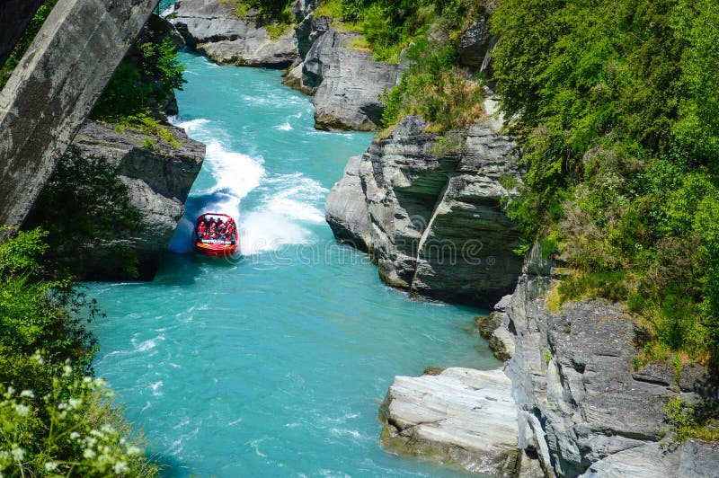 Red Jet Boat Navigating River Stock Image - Image of south, forest ...