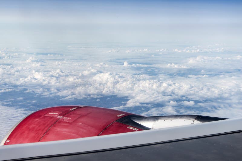 Red Jet Engine Turbine Look through Aircraft Window on Sunny Day Blue ...