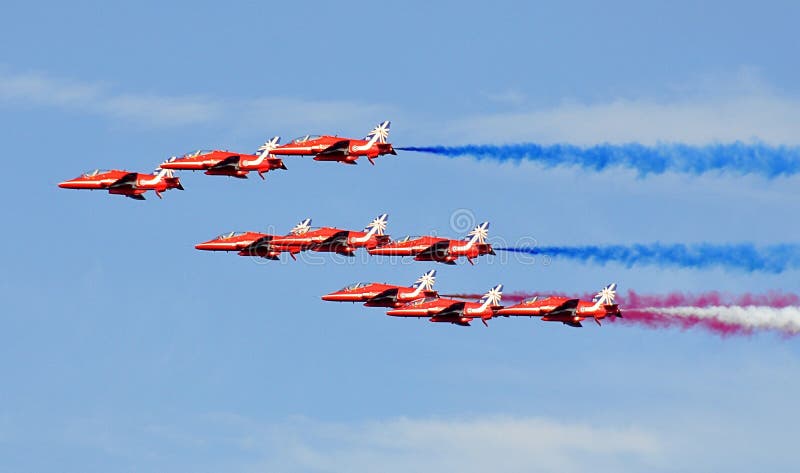Red Jet Fighter Planes With Assorted Colors Of Smoke On Horizon Picture ...