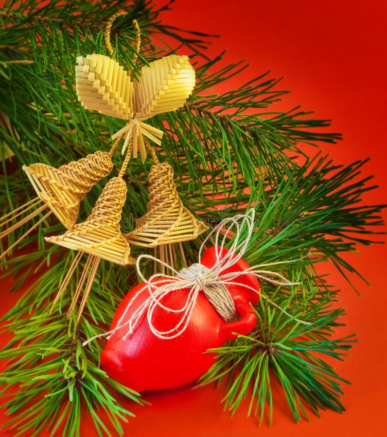 Red Jug, Straw Hand Bells and Fir-tree Branch Stock Image - Image of ...