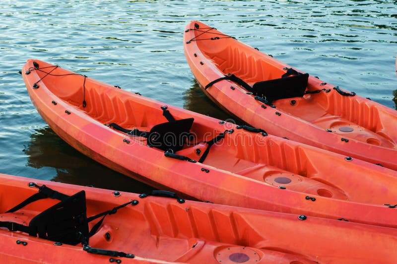 Red Kayak on Dark River Water Stock Photo - Image of travel, tourism ...
