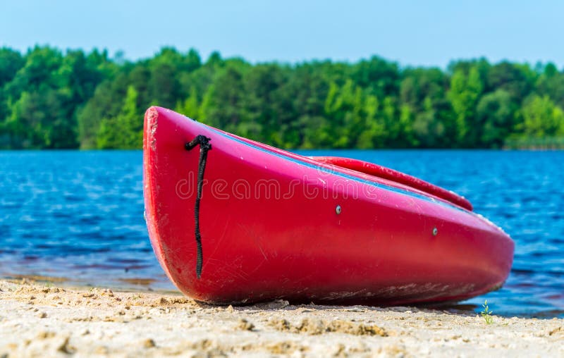 The red kayak stock image. Image of water, beach, forest - 55988025