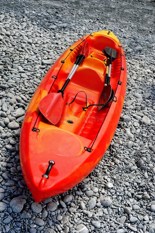 Red Kayak with Oarson on Sea Beach Stock Photo - Image of outdoor, blue ...
