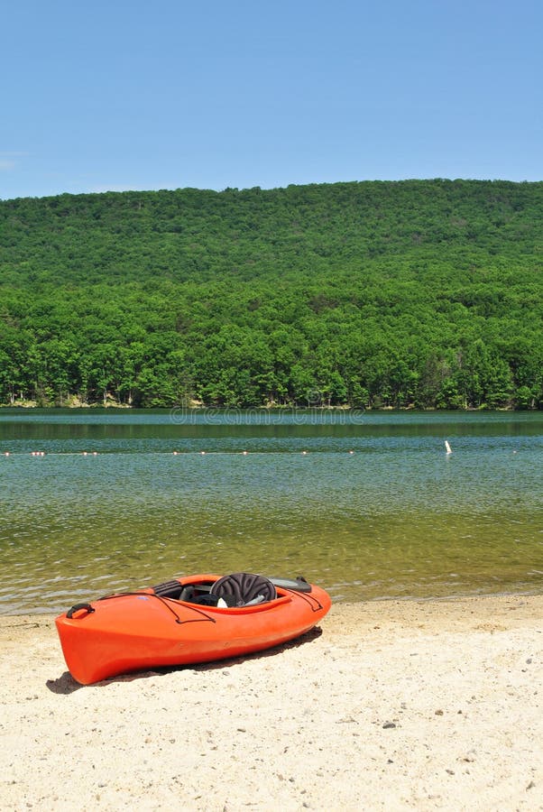 Kayak Resting on the Shore of Ninigret Pond Stock Image - Image of ...