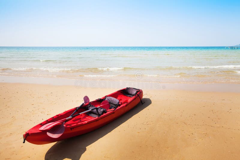 Red kayak stock image. Image of kayaking, island, active - 61372749