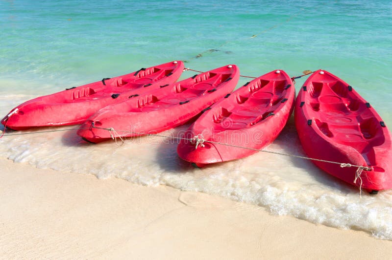Red Kayaks Boat on Inside Beach. Stock Photo - Image of colored ...