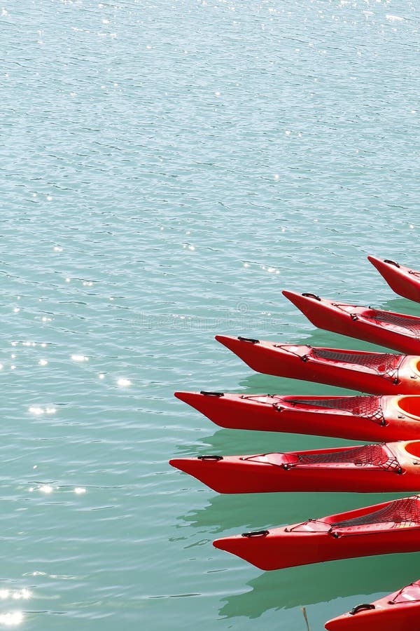 Red kayaks in a lake stock photo. Image of adventure - 56909246