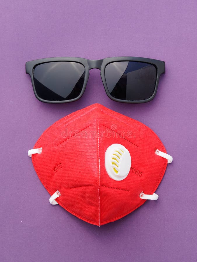 Red KN95 Protective Face Mask with Black Sunglasses. Stock Image ...