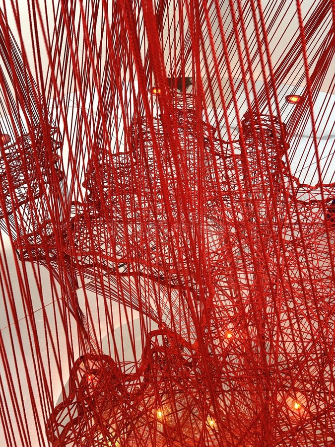 Red Knitted Art Object. Decorative Element. Wall Decoration. Red Thread ...