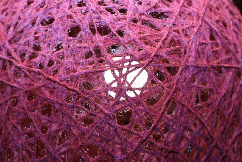 Red Knitted Ball of Red Thread As the Ceiling for a Light Bulb Stock ...