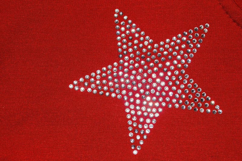 Red Knitted Fabric with Rhinestones Laid Out in the Shape of a Star ...