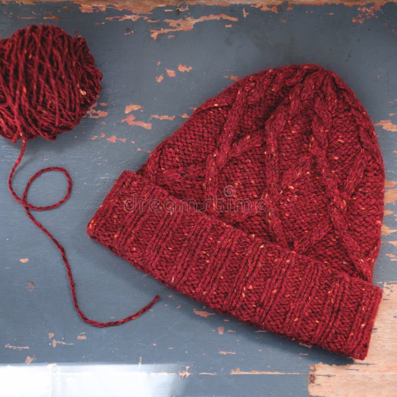 Red Knitted Tweed Hat with a Pattern Stock Photo - Image of female ...