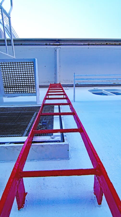Red ladder for the crew stock image. Image of ladder - 290338305
