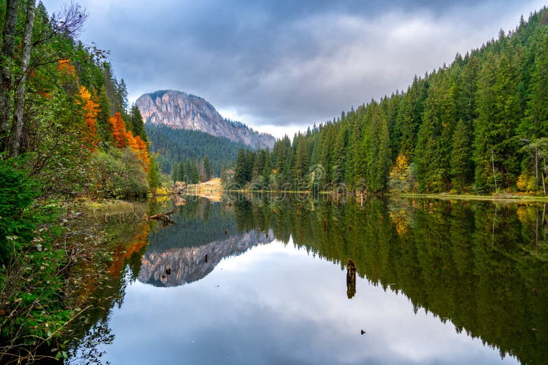 Red Lake and Suhard Peak at Fall, Transylvania, Romania Stock Photo ...
