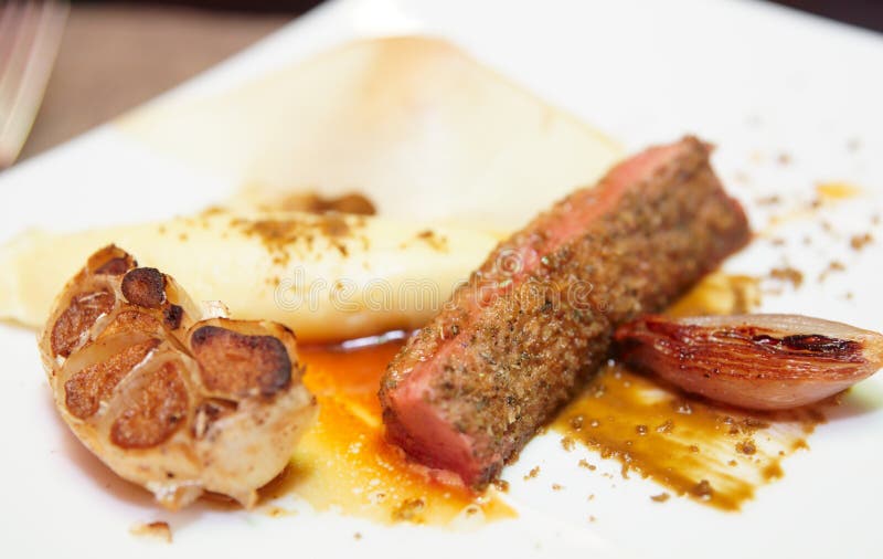 Red lamb meat on plate stock photo. Image of porcelain - 16693330