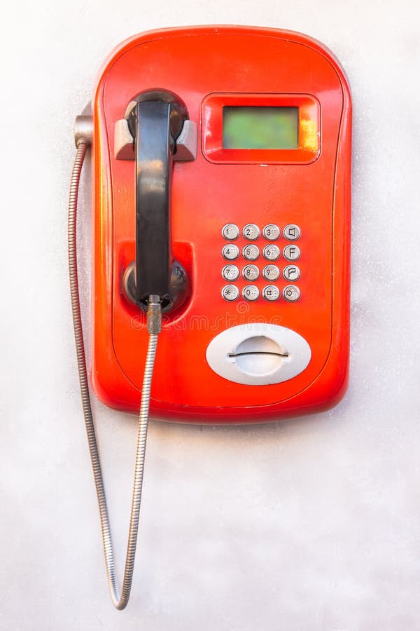 Red Landline Phone with Buttons on the Wall Stock Photo - Image of ...