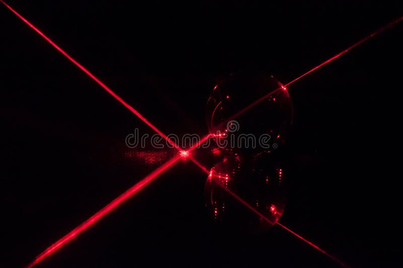 Red Laser Beam Reflecting on a Mirror Stock Photo - Image of reflection ...