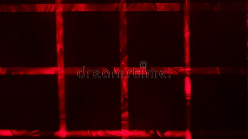 Red Laser Beams from Stage Lights Create a Checkered Pattern in a Dark ...