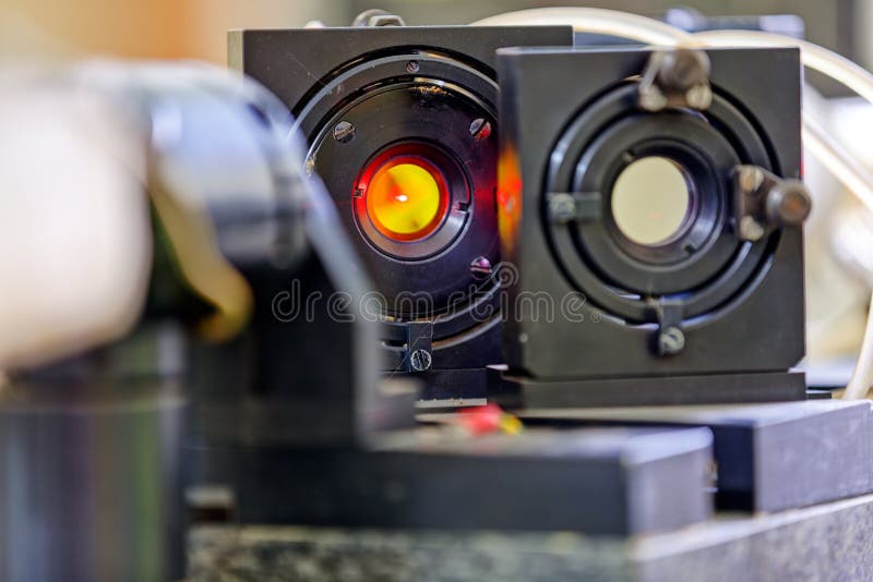 Red laser in laboratory stock photo. Image of photon - 55574388