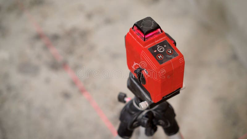 Red Laser Level Tool Projecting a Line on the Floor Stock Photo - Image ...