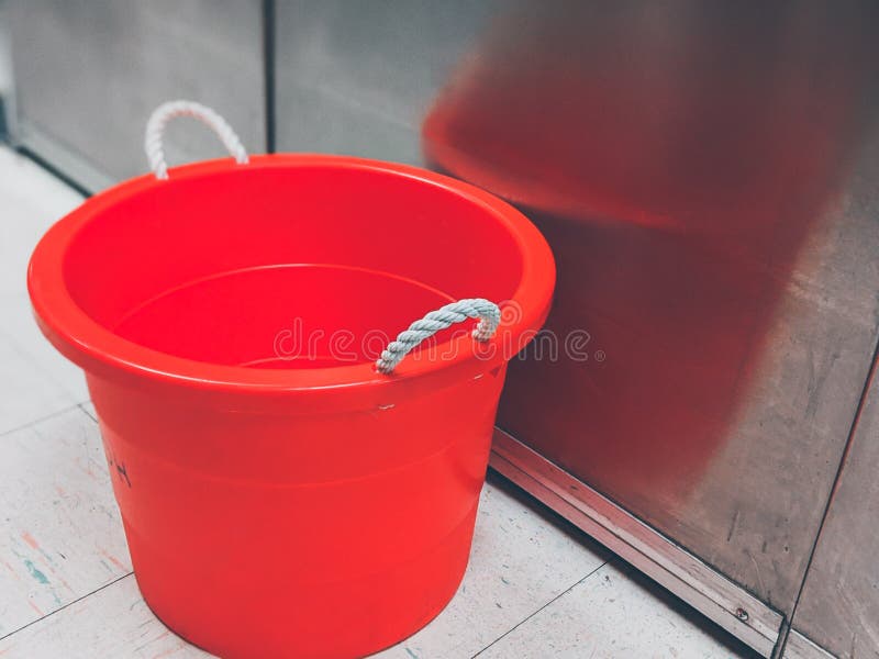 Red Laundry Bucket on the Floor Stock Image - Image of floor, basket ...