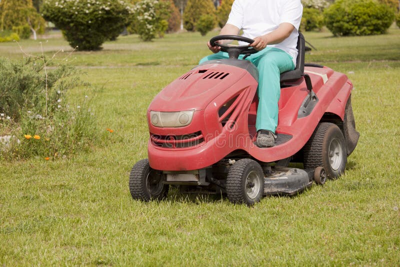 Red Lawn Mower Cutting Grass Stock Photo - Image of equipment, care ...