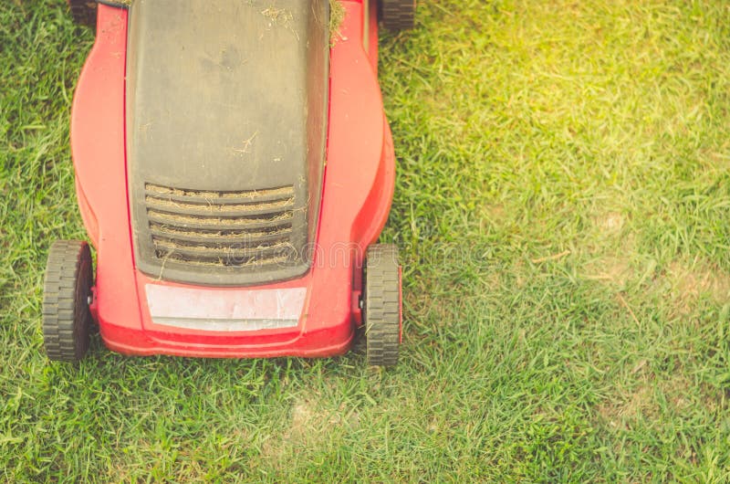 Red Lawn Mower Cutting Green Grass/red Lawn Mower Cutting Green Grass ...