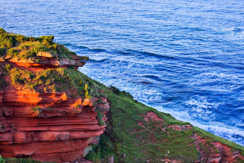 Red Layered Cliffs of Scotland`s South-East Coast Stock Photo - Image ...