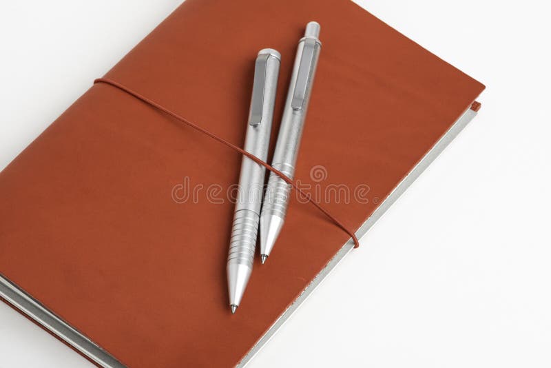 Red Leather Journal Cover with Two Ballpoint Pens Stock Image - Image ...