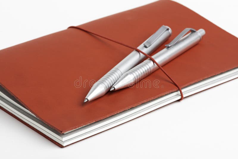 Red Leather Journal Cover with Two Ballpoint Pens Stock Photo - Image ...